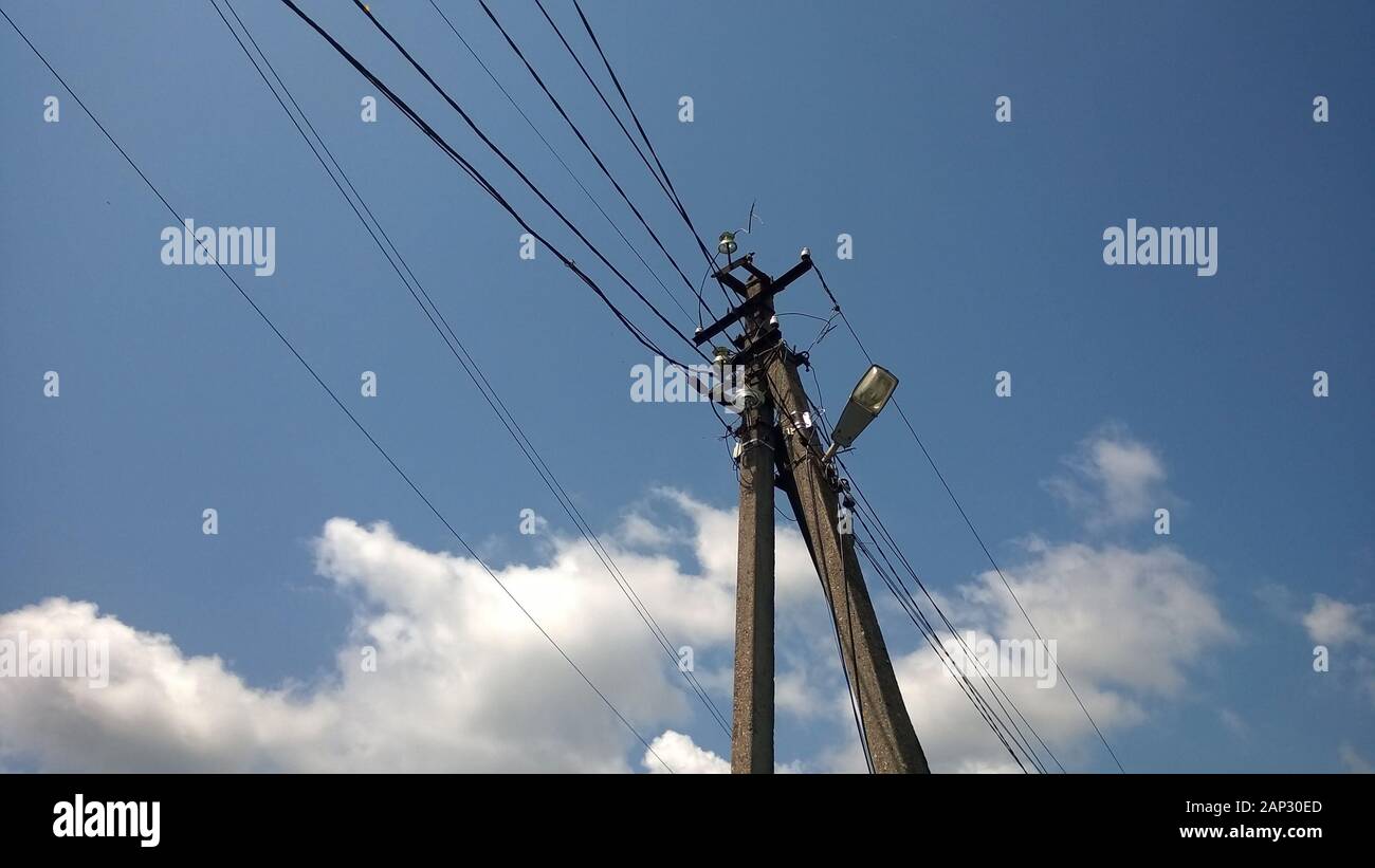 Lamp post with electro wires Stock Photo - Alamy