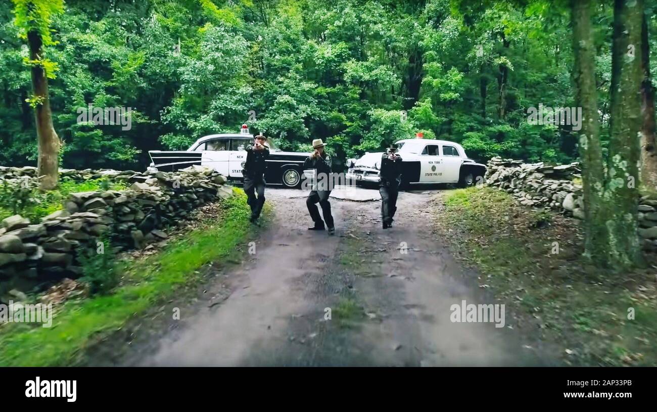 MOB TOWN, center: David Arquette as Sgt. Ed Croswell, 2019. © Saban ...