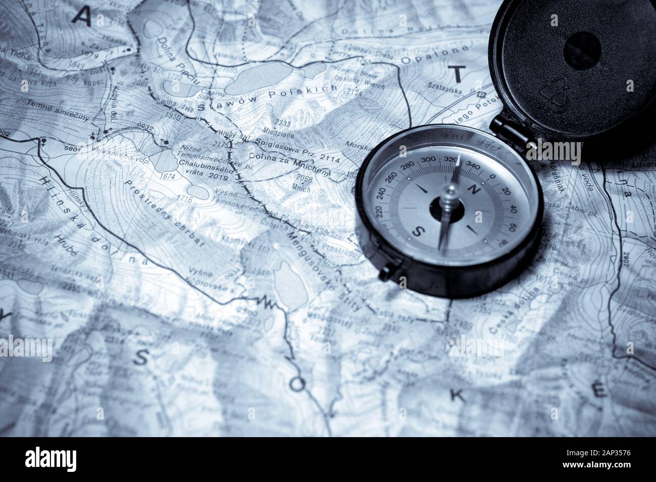 Compass on a topographic map Stock Photo - Alamy