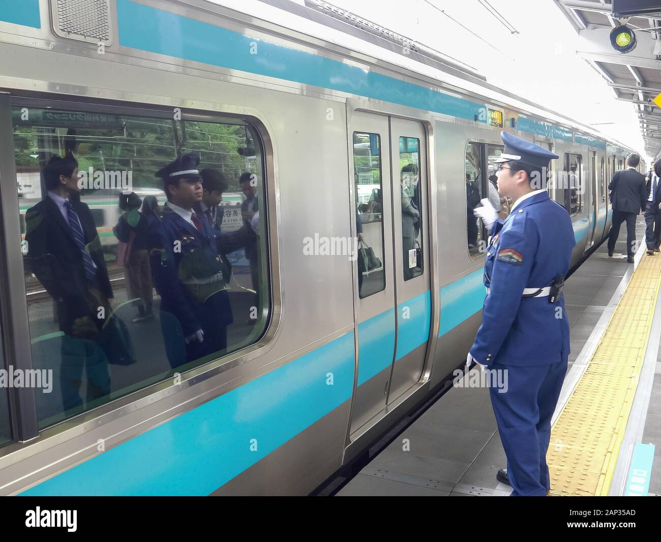 Japanese train guard hi-res stock photography and images - Alamy