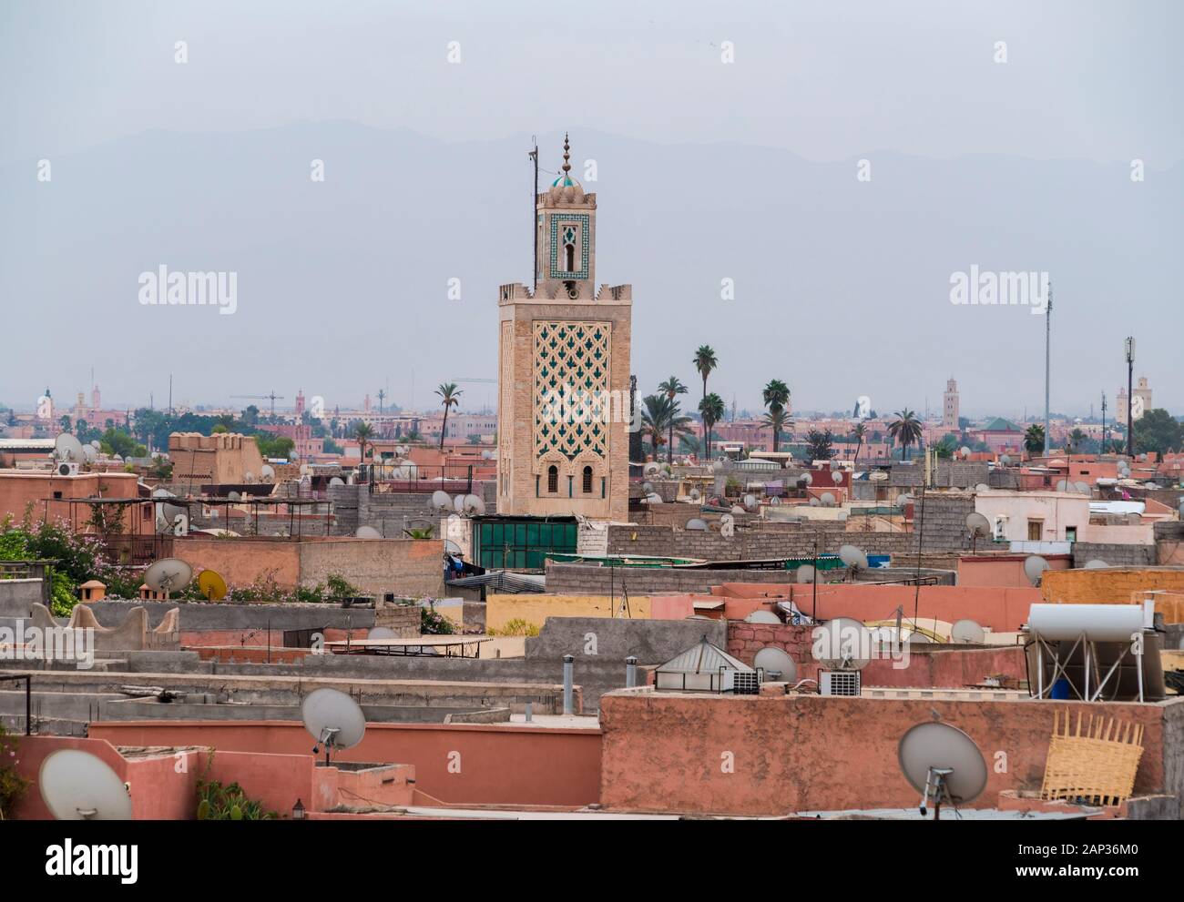 Skyline of Medina with mosque minaret and Atlas mountain far behind ...