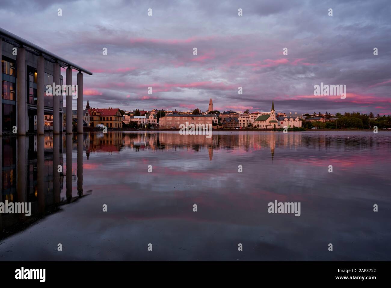 Picturesque scenery of lake with tranquil water reflecting old ...