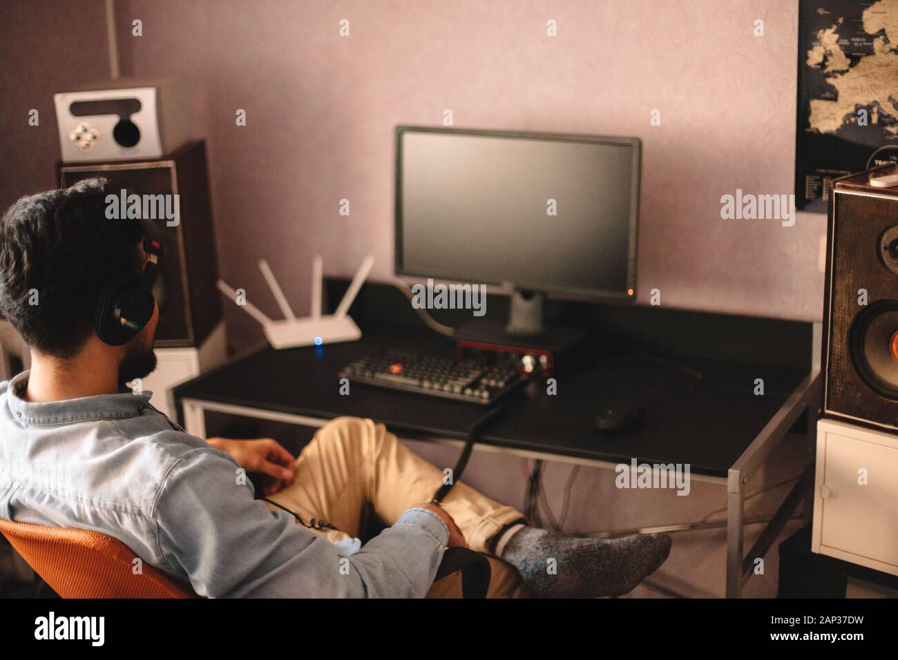 Young composer listening music in hi-res stock photography and images ...