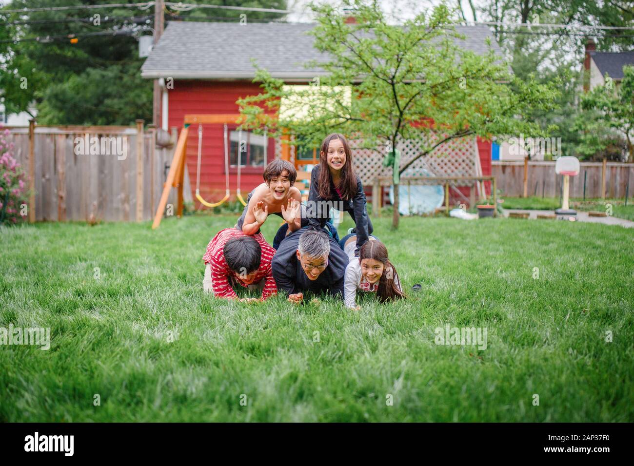 Human pyramid hi-res stock photography and images - Alamy