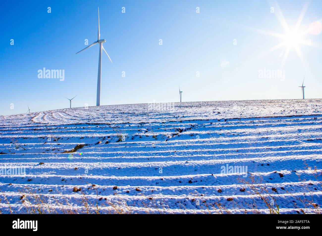 Snow wind turbines hi-res stock photography and images - Alamy