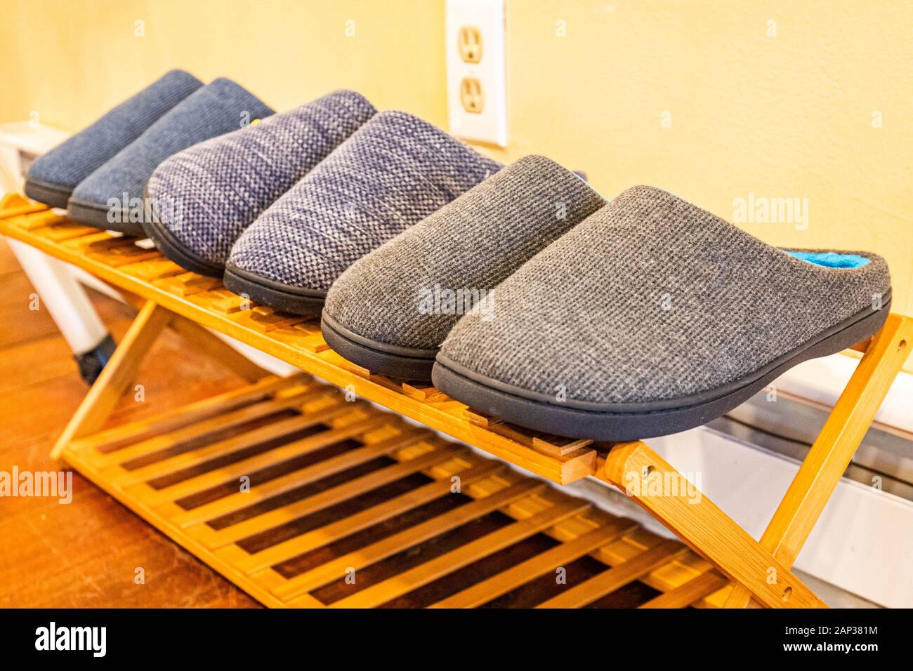 Set of sleeper shoes on stand at home indoor Stock Photo - Alamy