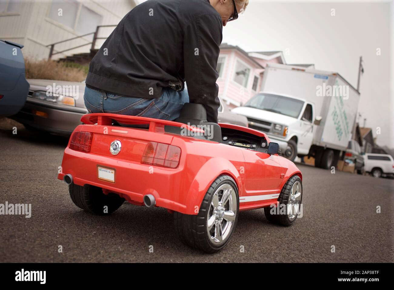 Man red car small hi-res stock photography and images - Alamy