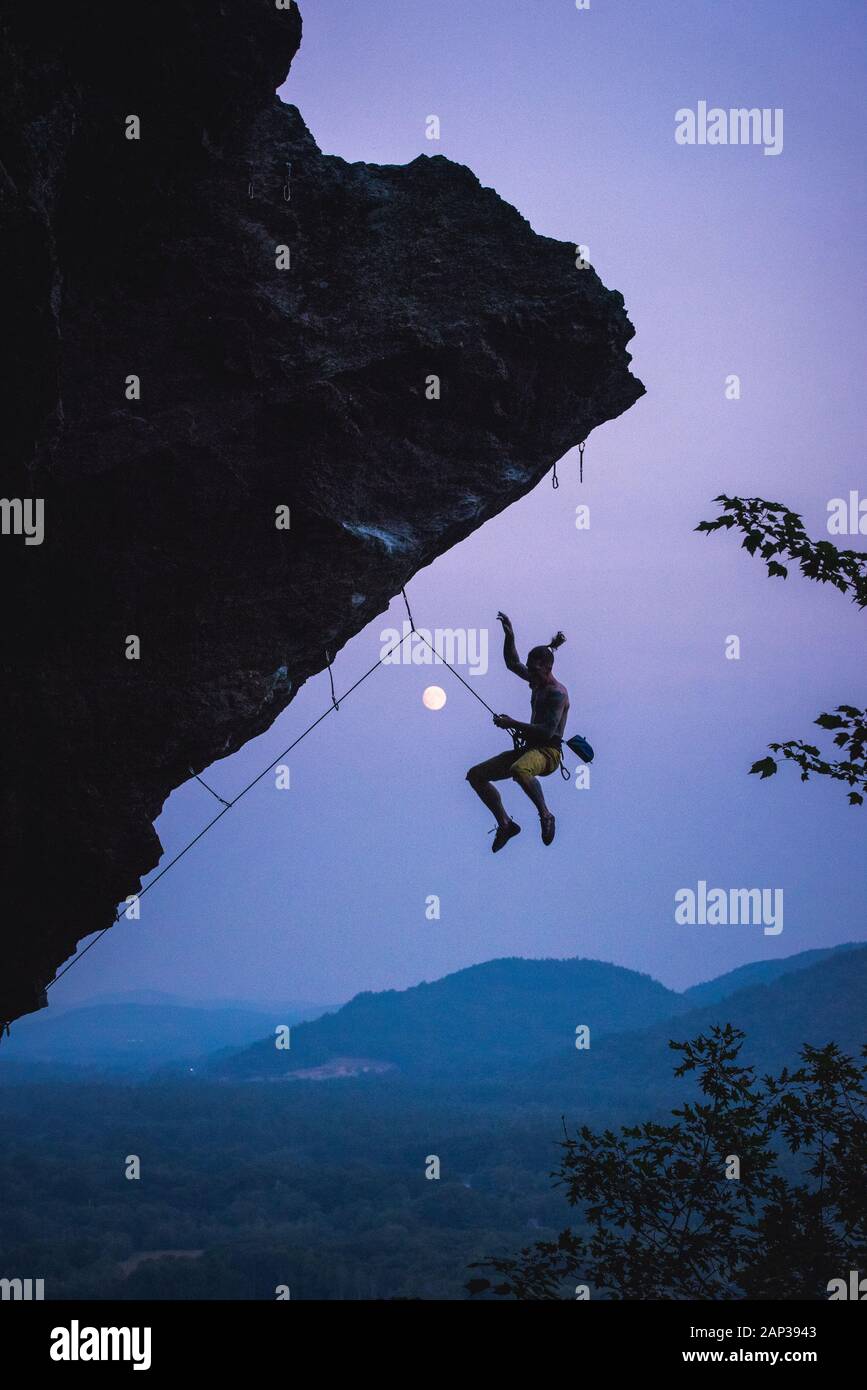Man falling off overhanging sport climbing route in New Hampshire Stock ...