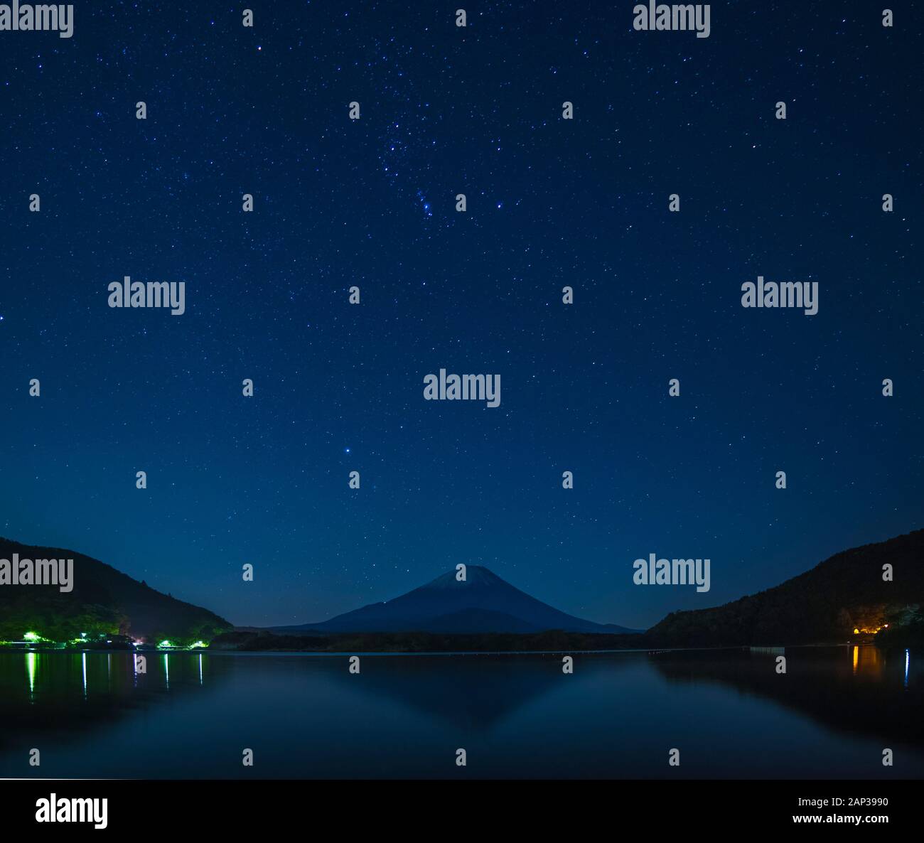 Starry sky over Mount Fuji on a clear night from lake Shoji, Yamanashi ...