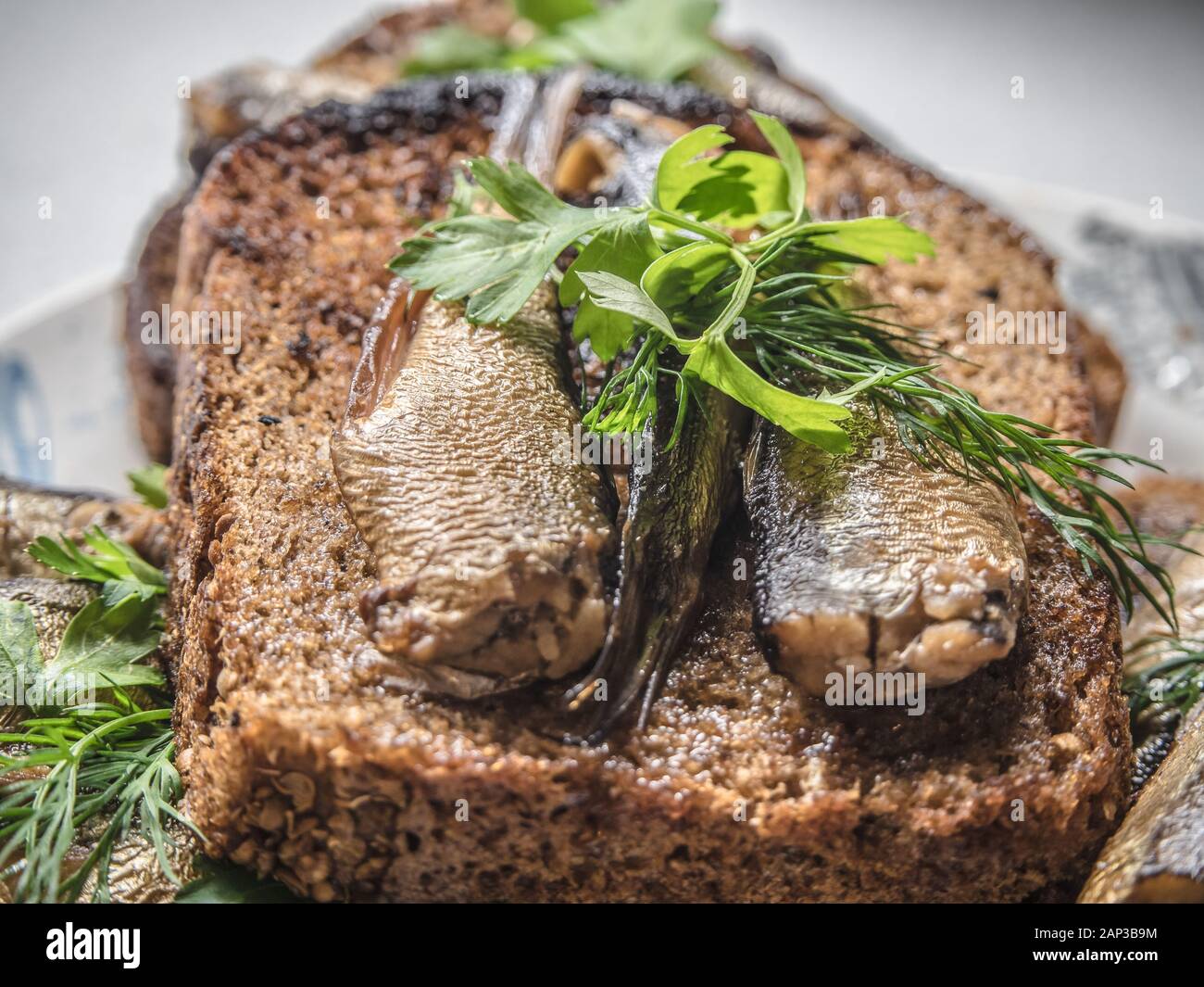 Sandwich sprats on bread Stock Photo - Alamy