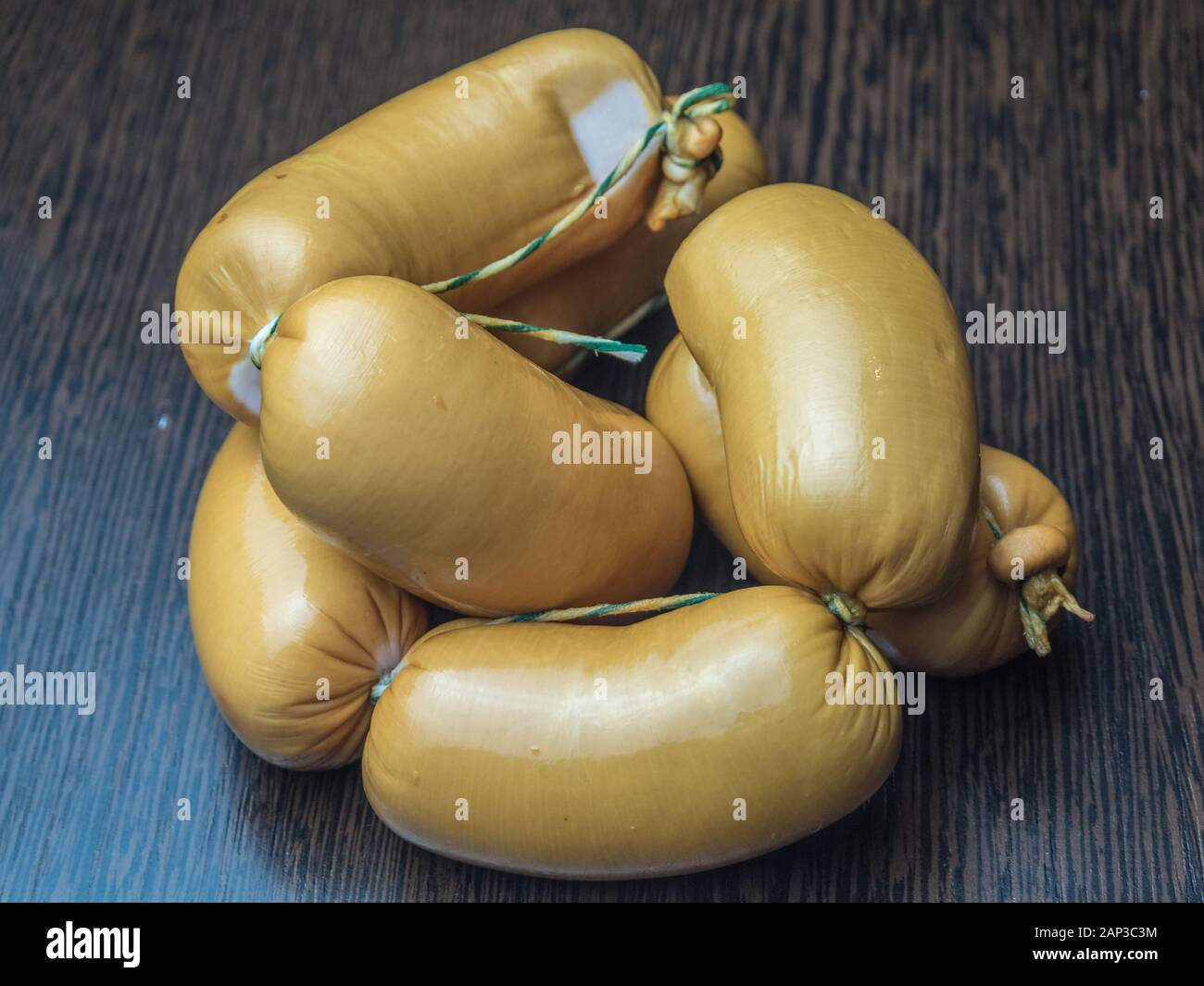 A group of wieners on a wood background Stock Photo - Alamy