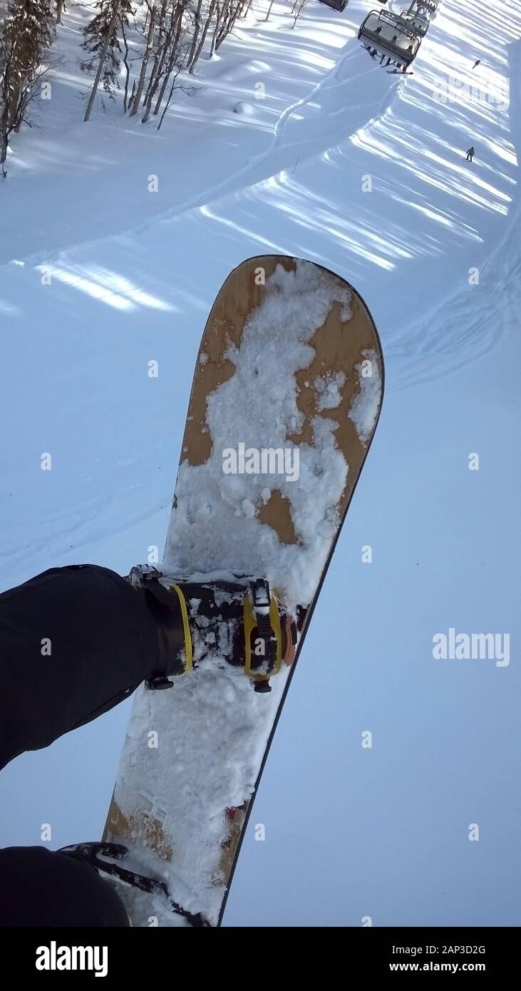 Feet snowboard slope Rosa Khutor Stock Photo - Alamy