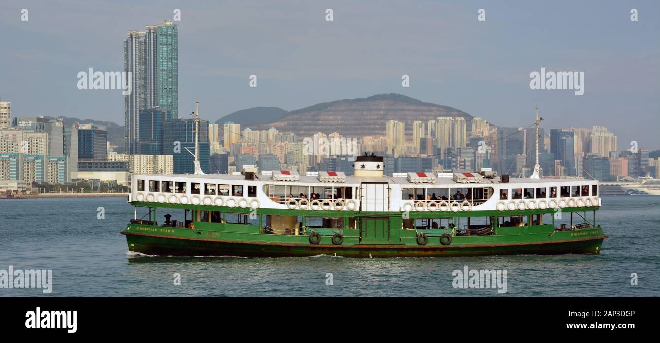 The iconic 1950's Star Ferry boats transport passengers between the ...
