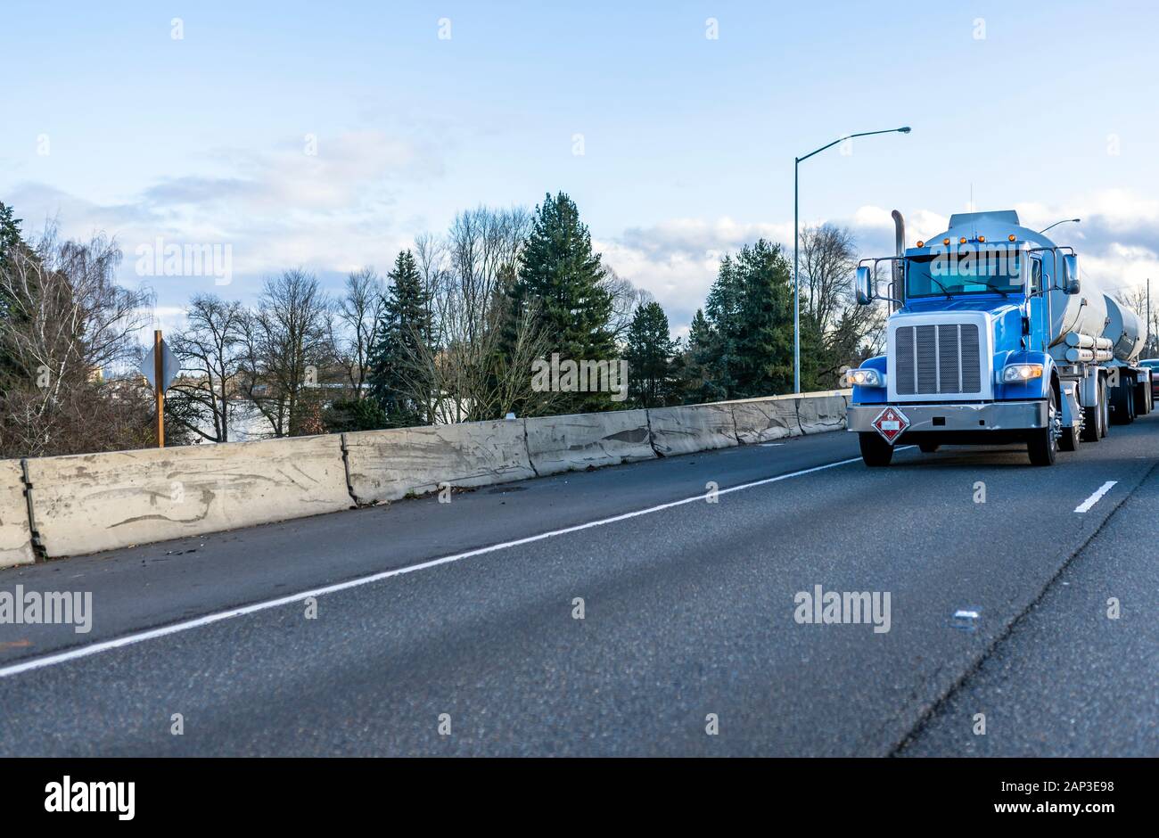 Blue big rig day cab semi truck with efficient eco-friendly diesel ...