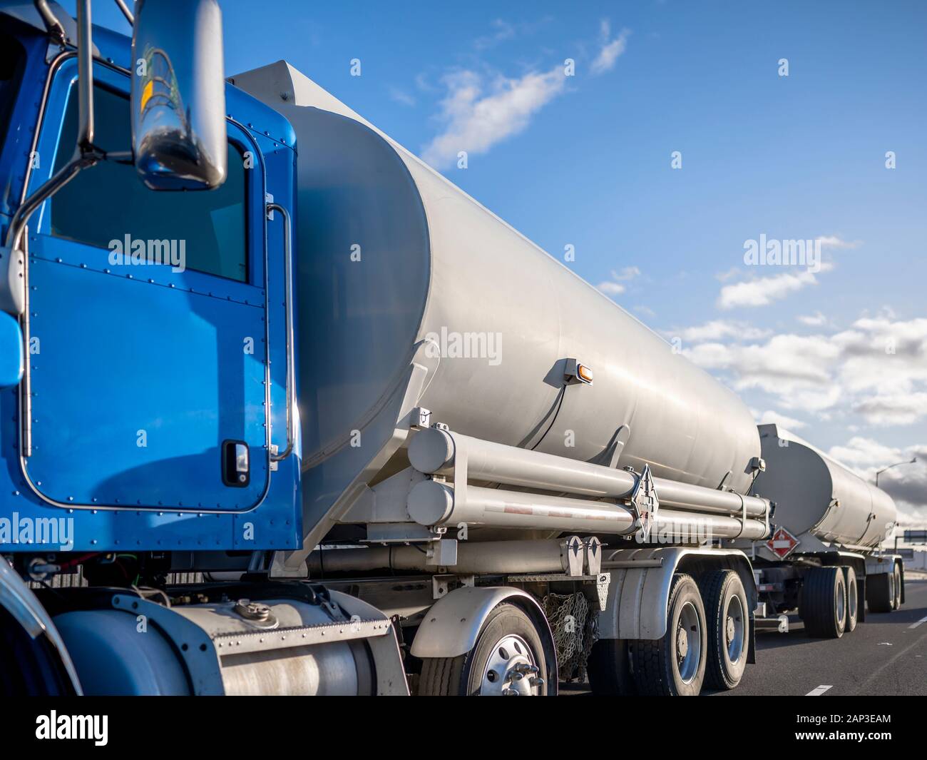 Blue big rig day cab semi truck with efficient eco-friendly diesel ...