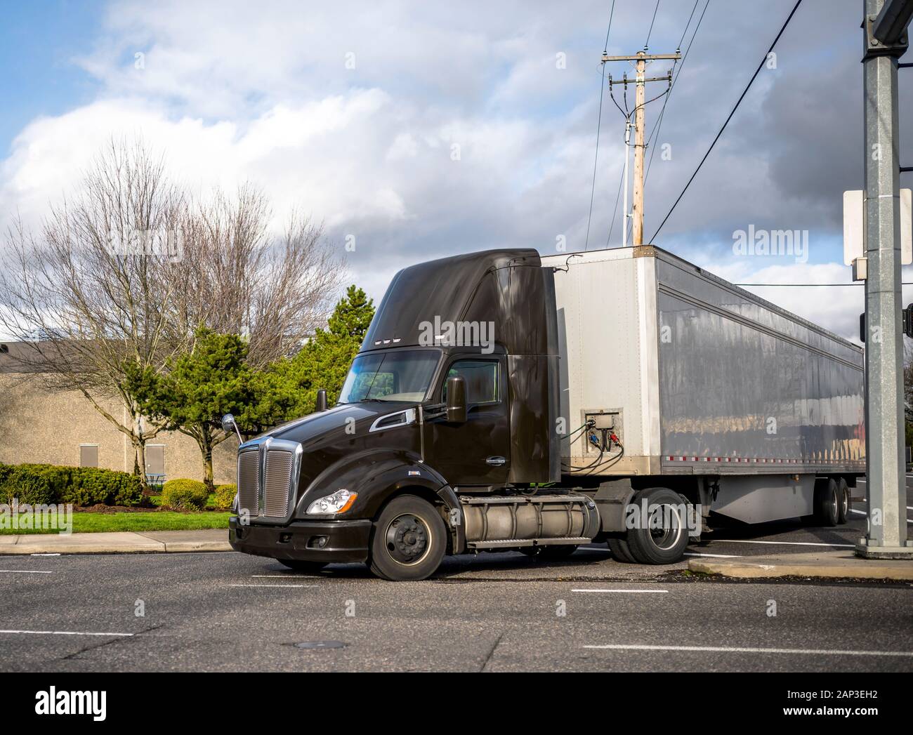 Big rig brown day cab semi truck with efficient eco-friendly diesel ...