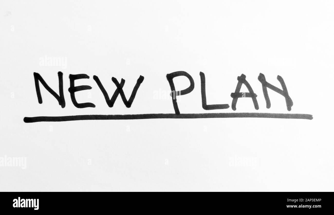 Hand written words - new plan - black marker on white paper Stock Photo ...