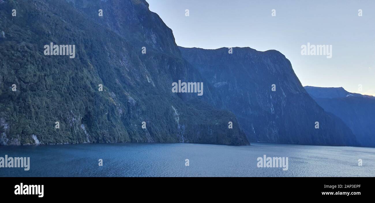 The Majestic Mountains and Dramatic Waterfalls of Milford Sound and ...