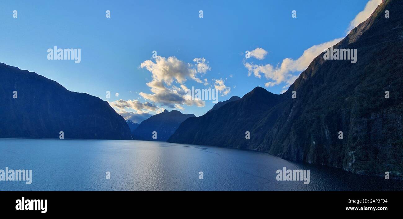 The Majestic Mountains and Dramatic Waterfalls of Milford Sound and ...