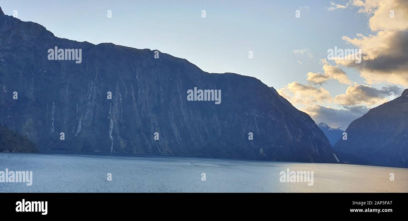 The Majestic Mountains and Dramatic Waterfalls of Milford Sound and ...