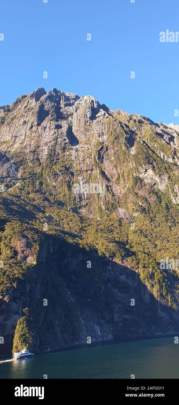 The Majestic Mountains and Dramatic Waterfalls of Milford Sound and ...