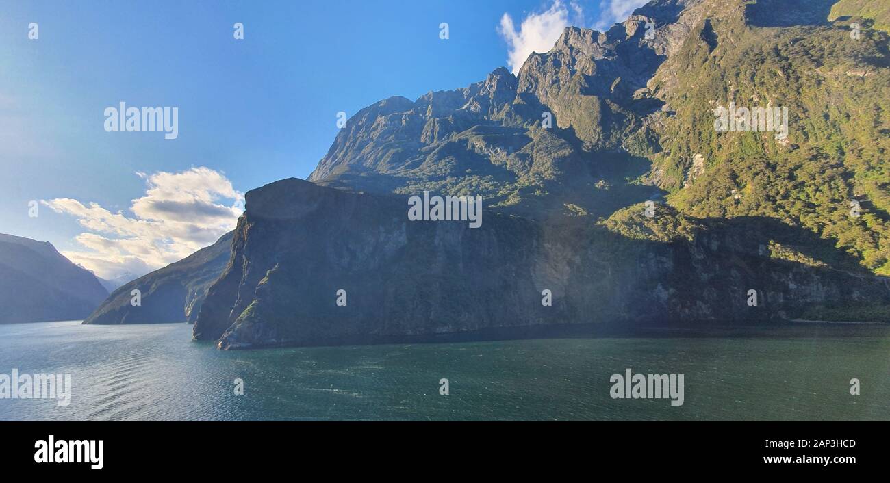 The Majestic Mountains and Dramatic Waterfalls of Milford Sound and ...