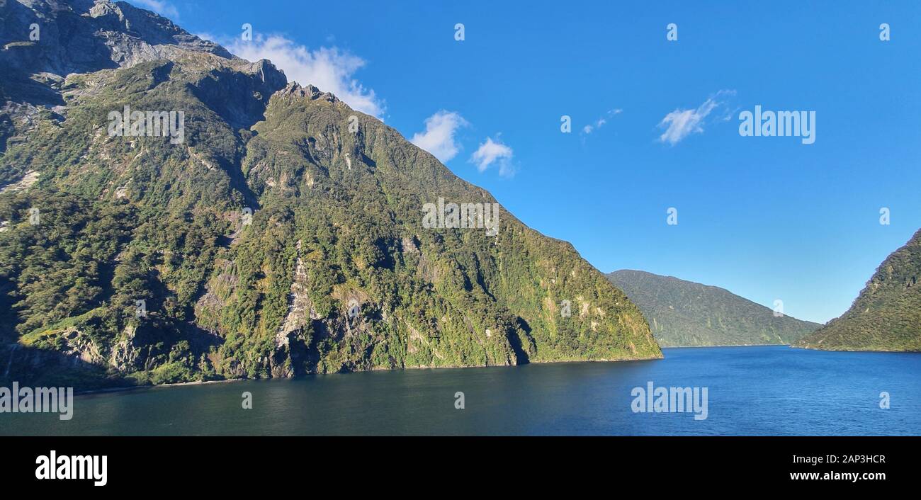 The Majestic Mountains and Dramatic Waterfalls of Milford Sound and ...
