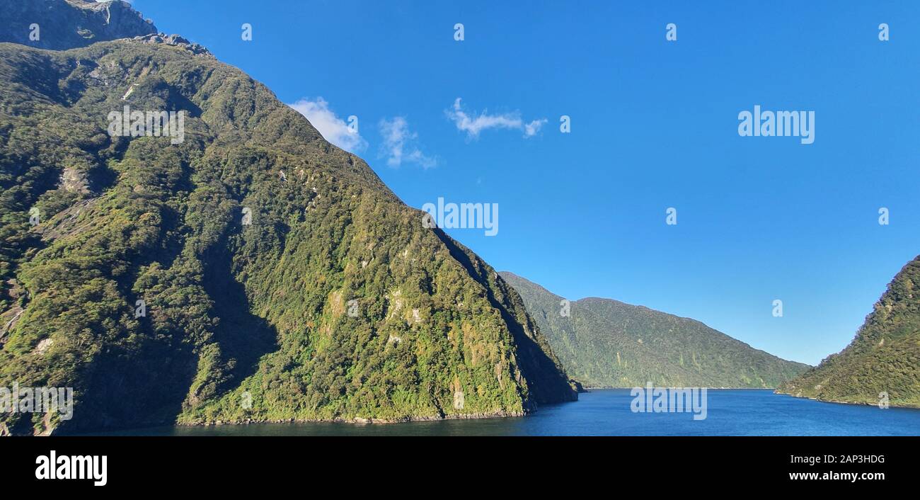 The Majestic Mountains and Dramatic Waterfalls of Milford Sound and ...
