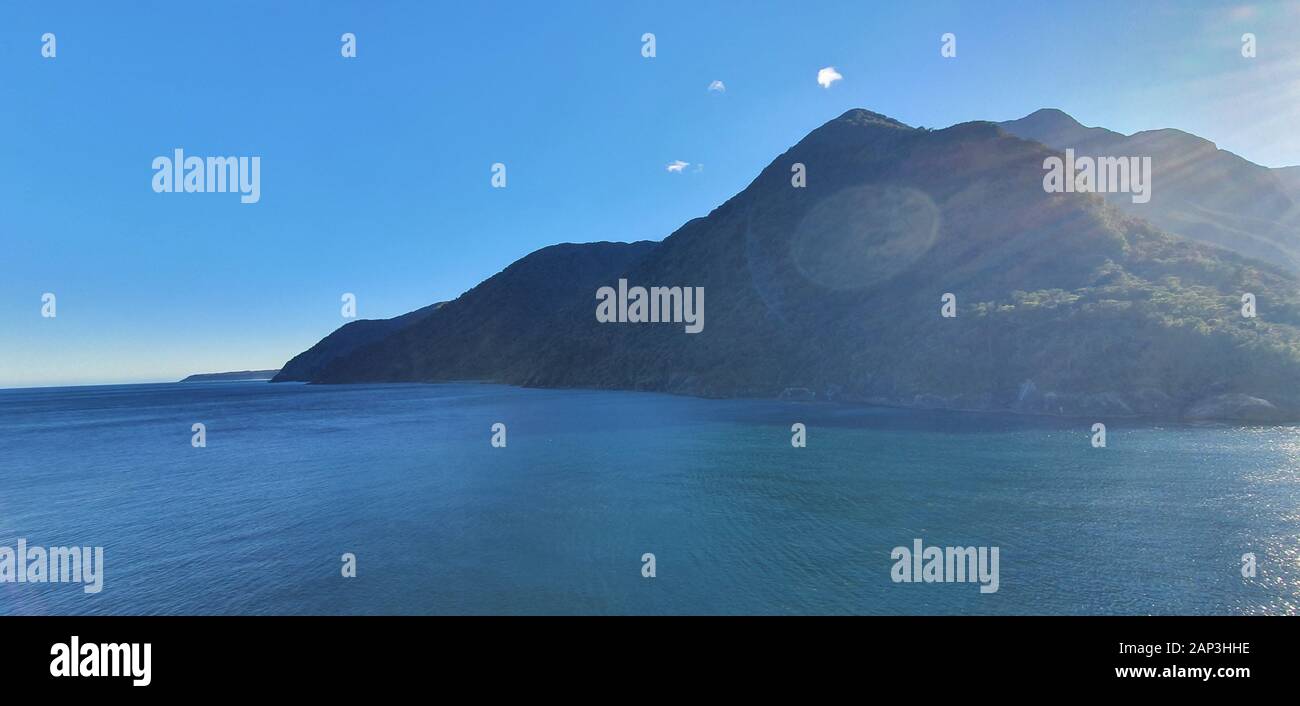 The Majestic Mountains and Dramatic Waterfalls of Milford Sound and ...