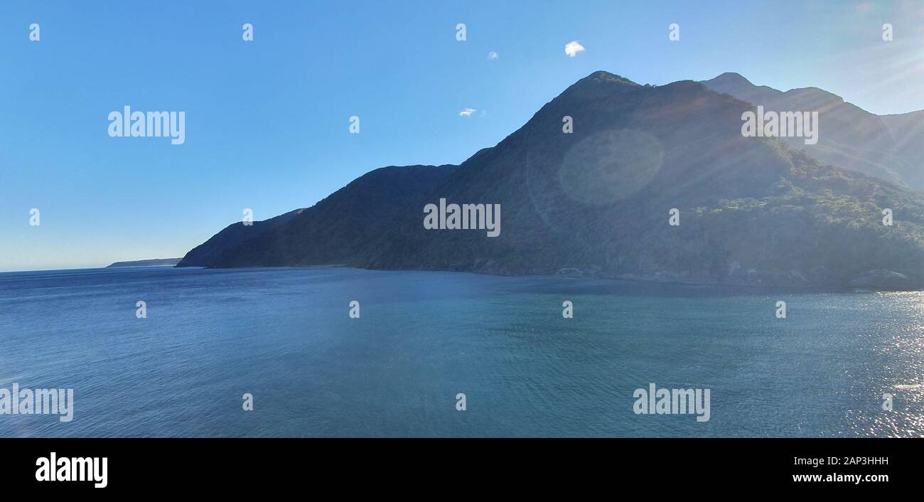 The Majestic Mountains and Dramatic Waterfalls of Milford Sound and ...