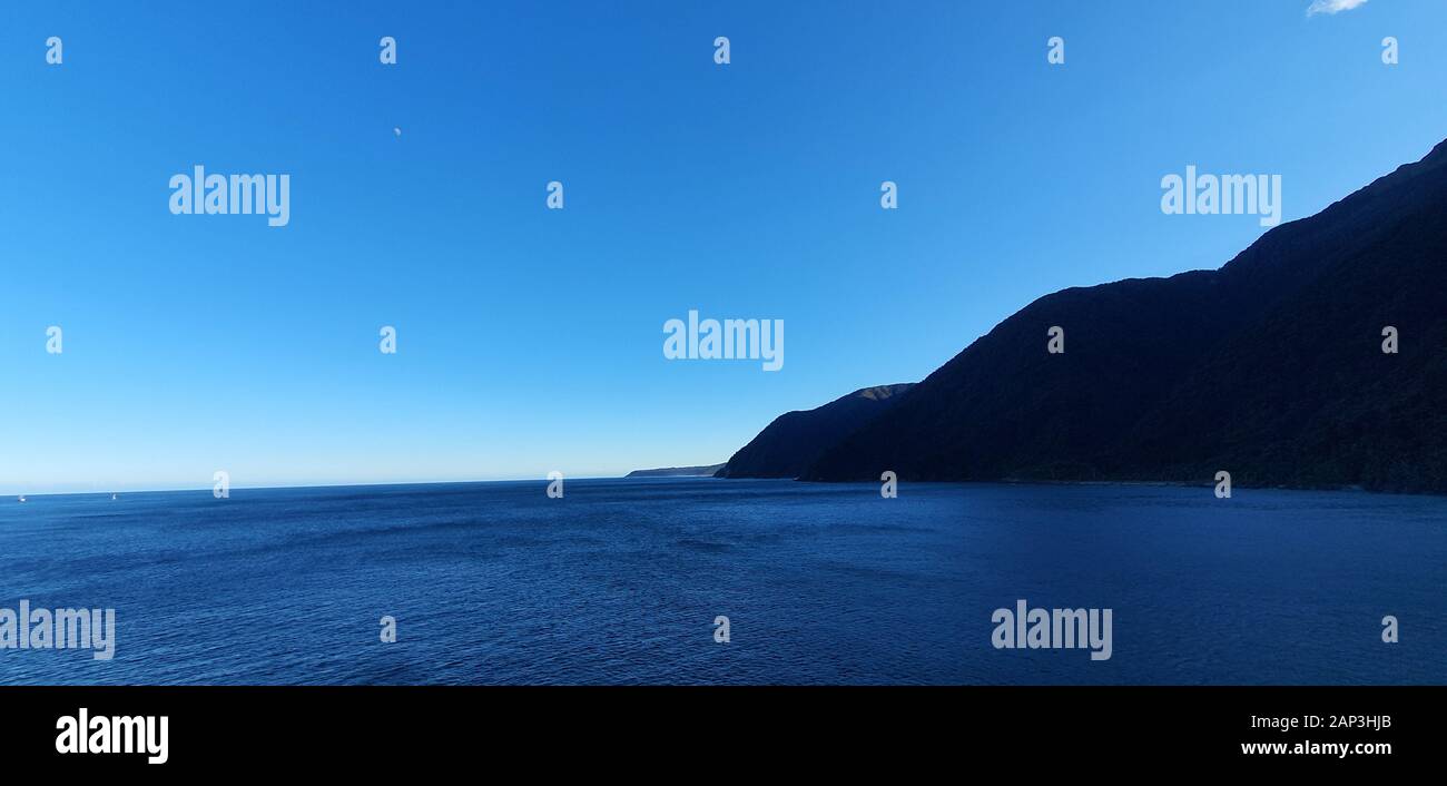 The Majestic Mountains and Dramatic Waterfalls of Milford Sound and ...