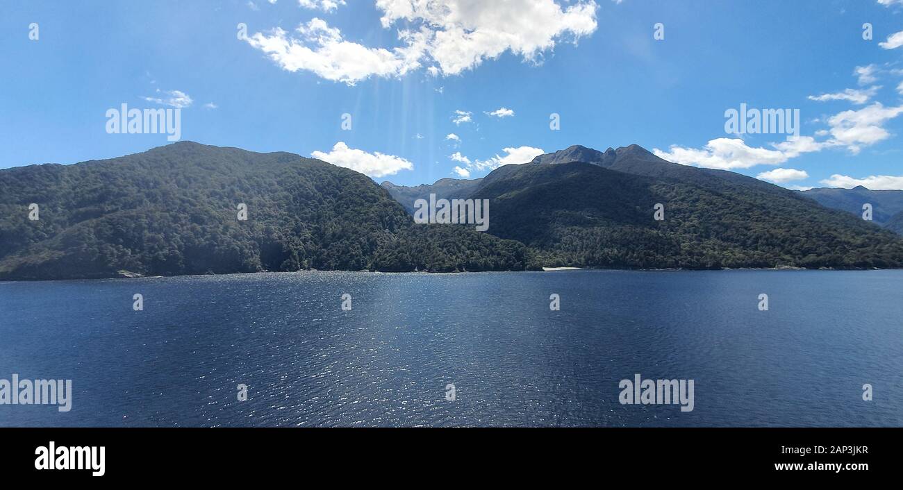 The Majestic Mountains and Dramatic Waterfalls of Milford Sound and ...