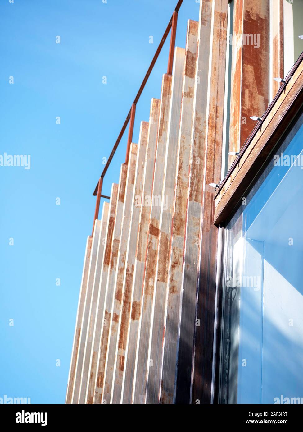 Vertical modern building with window and skyline with vertical artistic ...