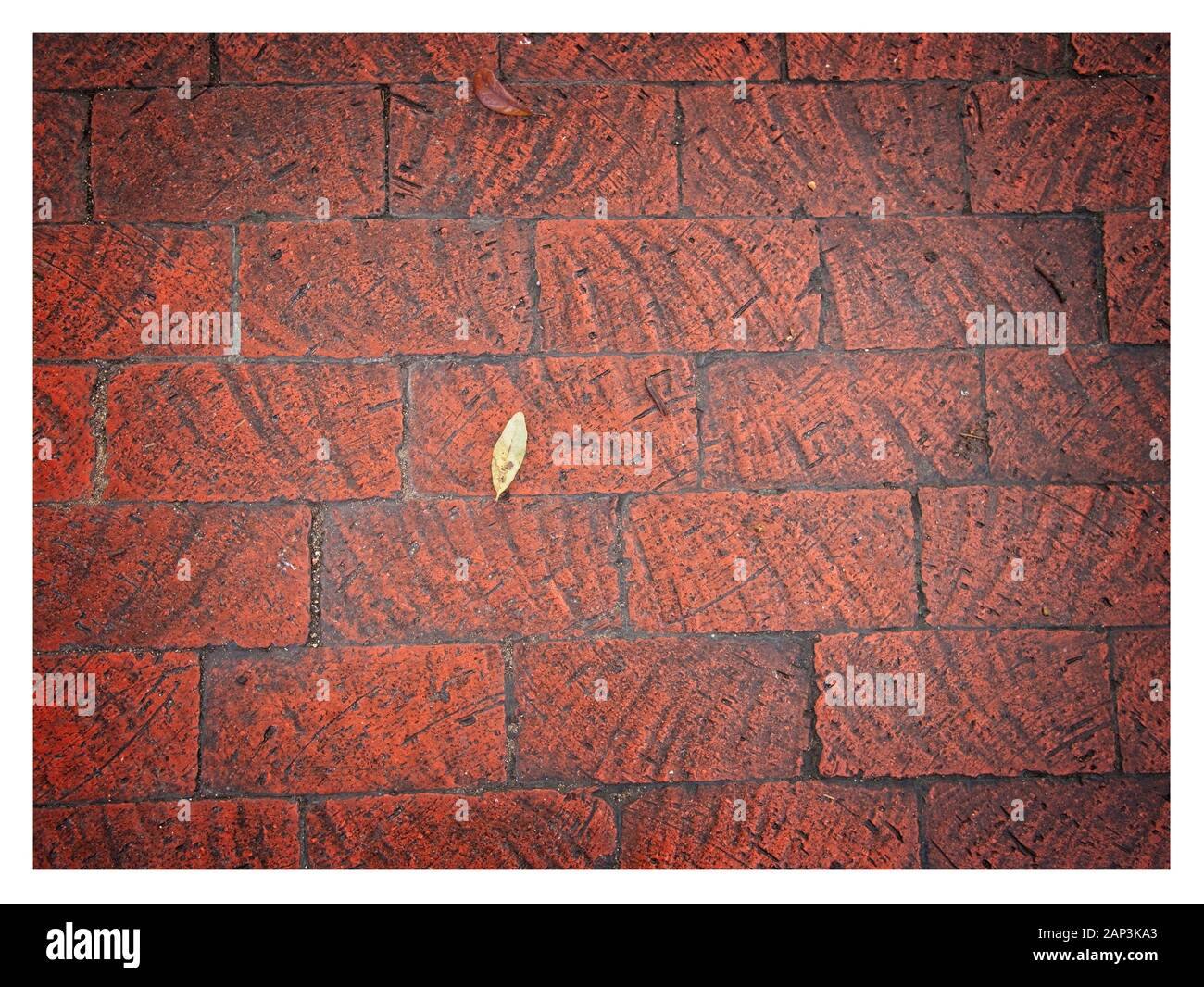 Coarse red rustic bricks with chiseled marks Stock Photo - Alamy