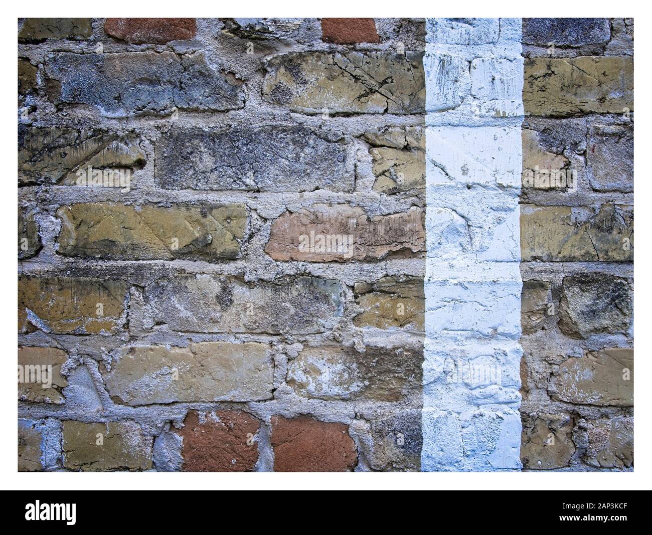 Colorful,coarse brick wall with painted vertical white stripe Stock ...