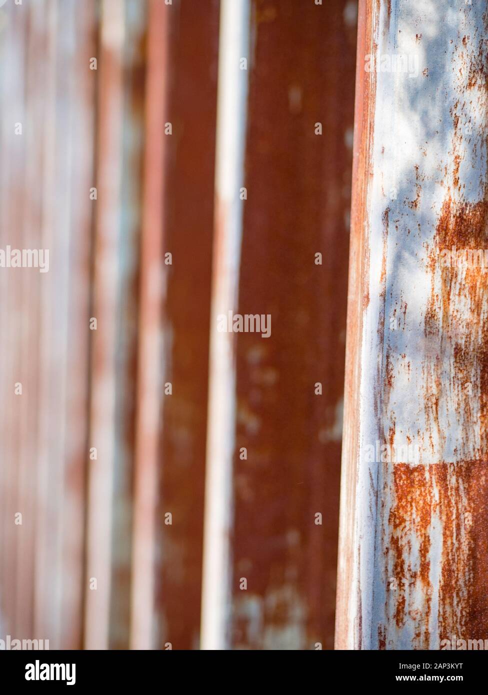 Textured, rustic metal slates on modern building Stock Photo - Alamy