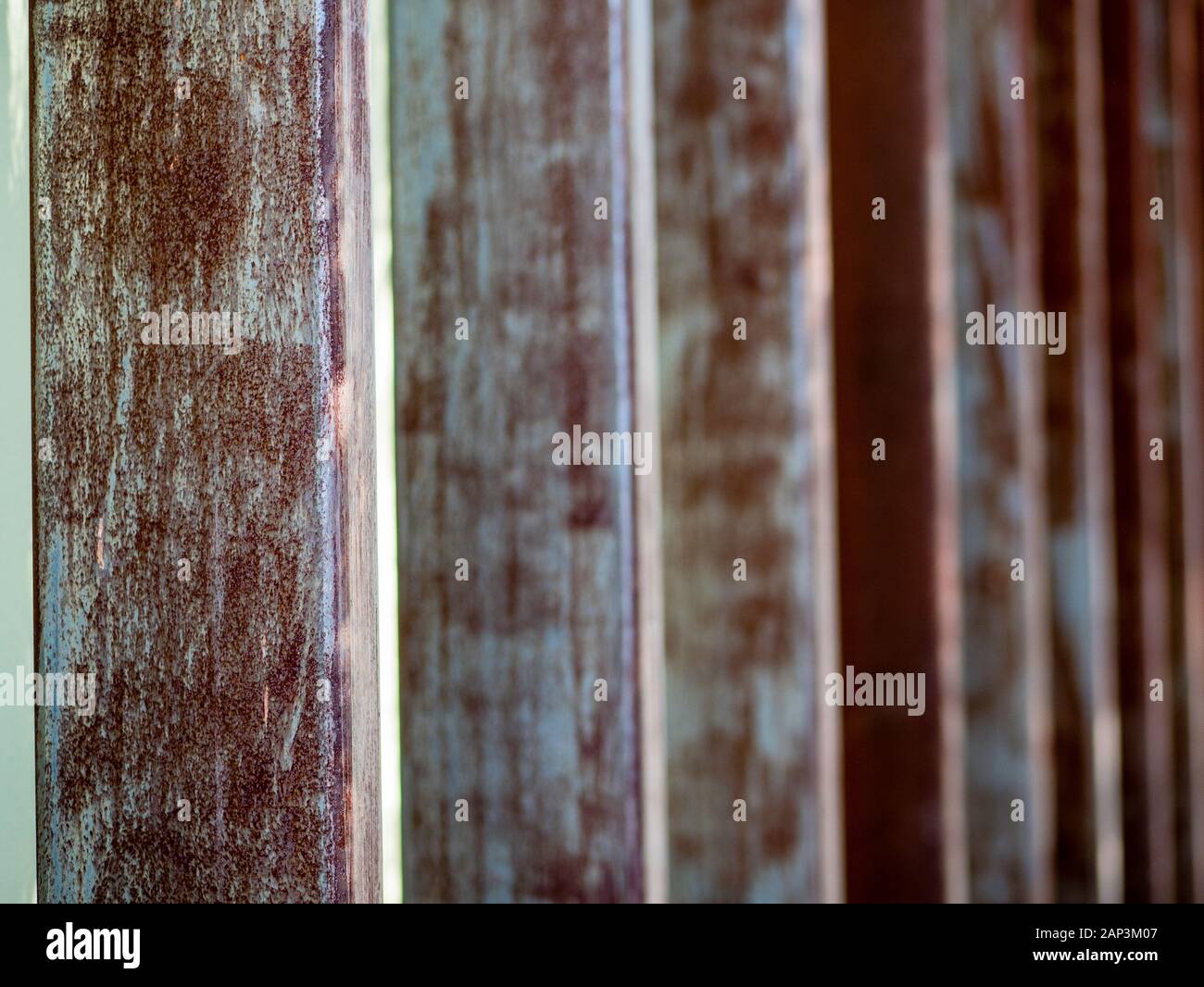 Textured, rustic metal slates on modern building Stock Photo - Alamy