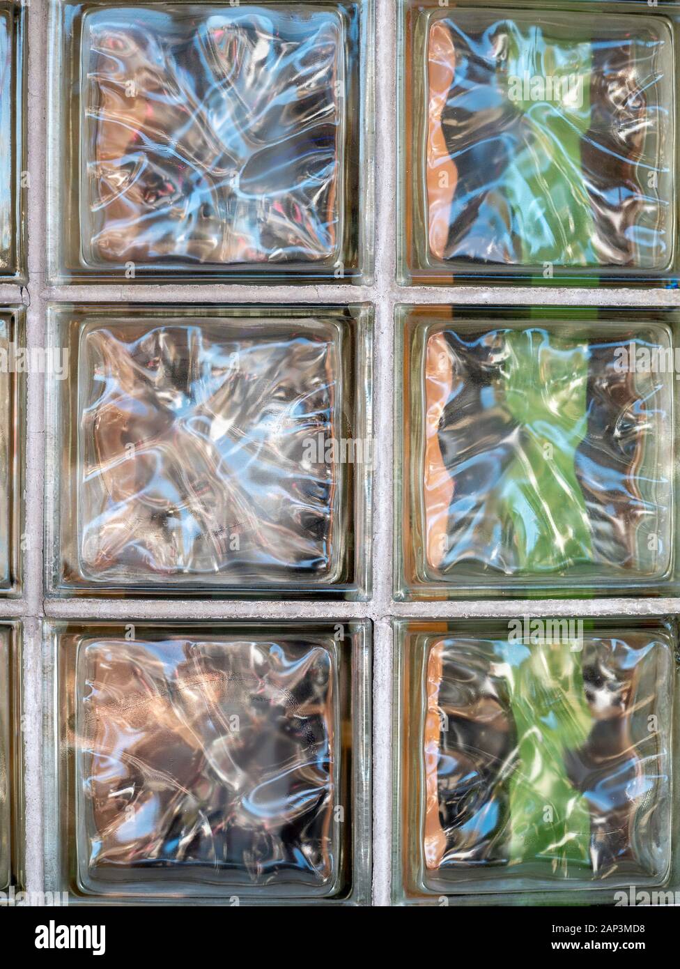 Colorful, square art deco rippled glass wall Stock Photo - Alamy