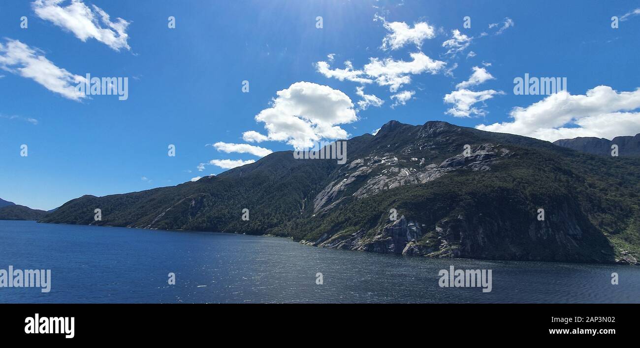 The Majestic Mountains and Dramatic Waterfalls of Milford Sound and ...