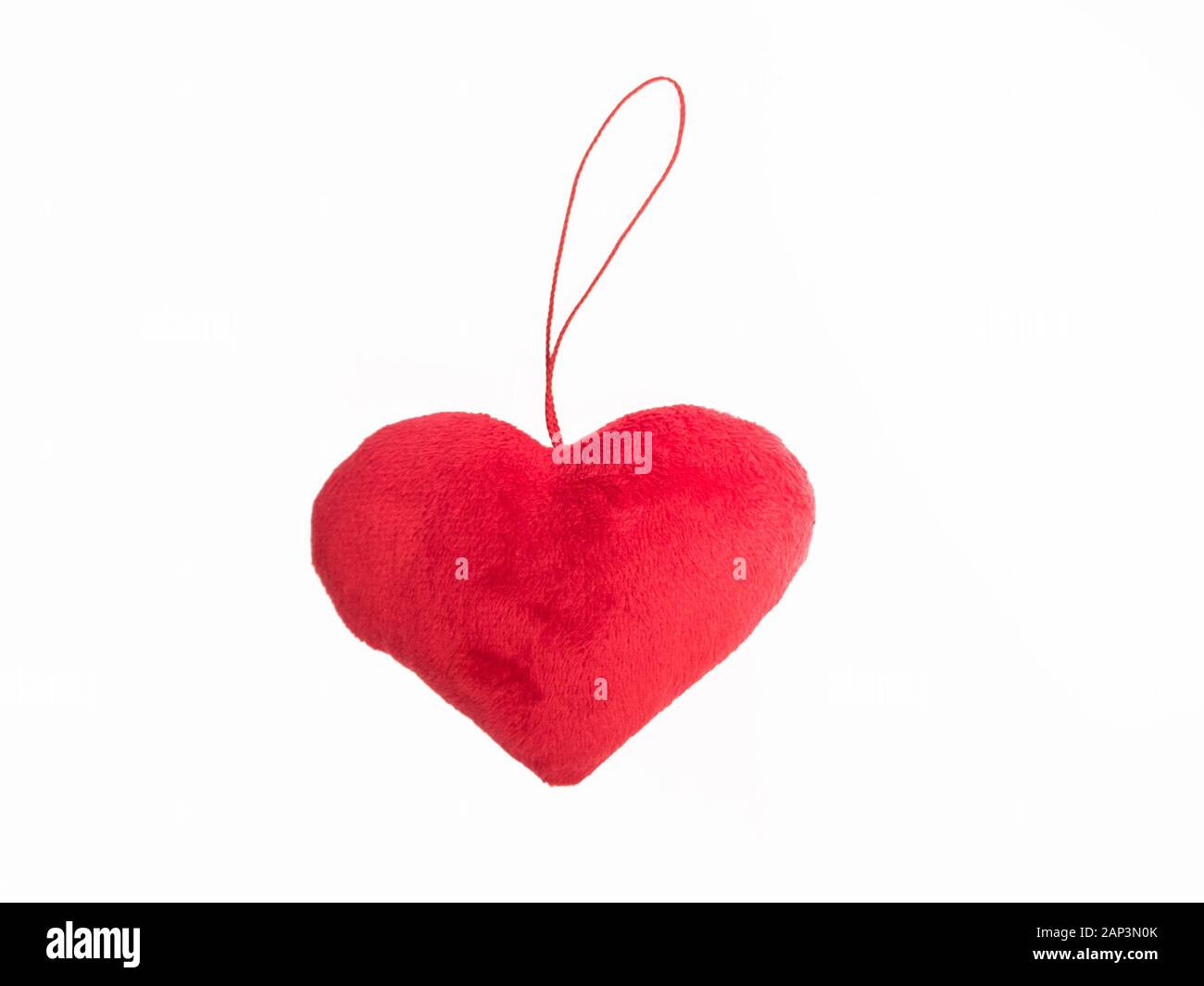 Soft toy red heart white background Stock Photo - Alamy