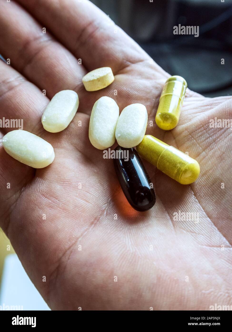 Tablets and drug capsule glucosamine and chondroitin in palm of your ...