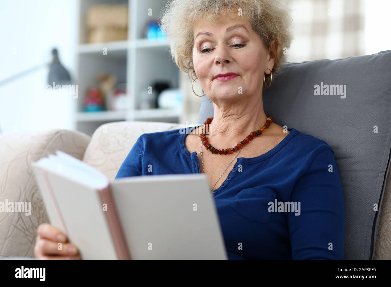 Female reading book Stock Photo - Alamy