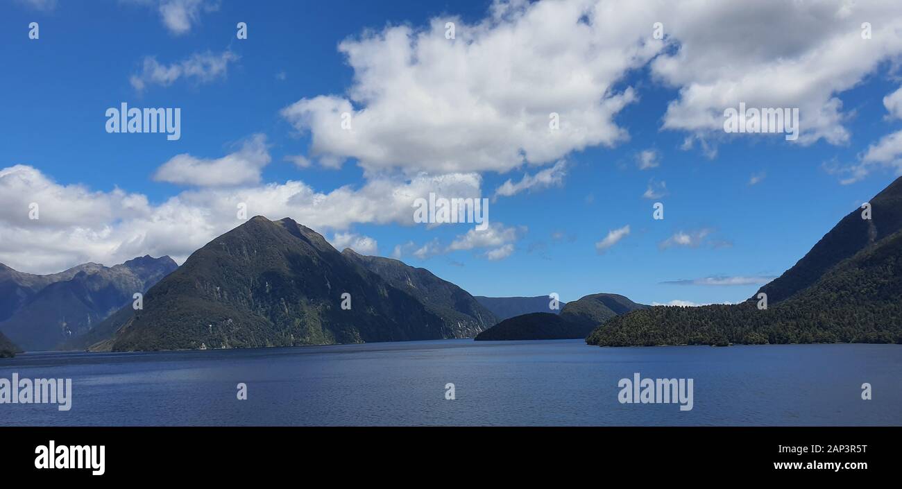 The Majestic Mountains and Dramatic Waterfalls of Milford Sound and ...