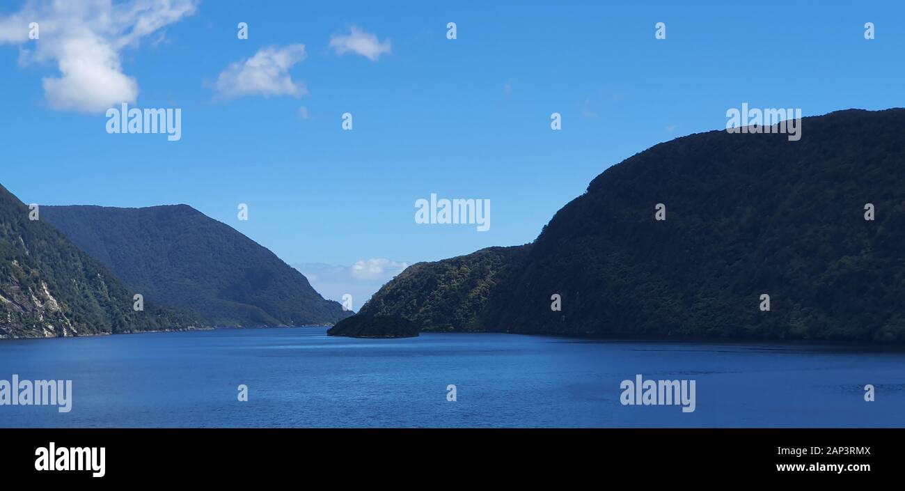The Majestic Mountains and Dramatic Waterfalls of Milford Sound and ...