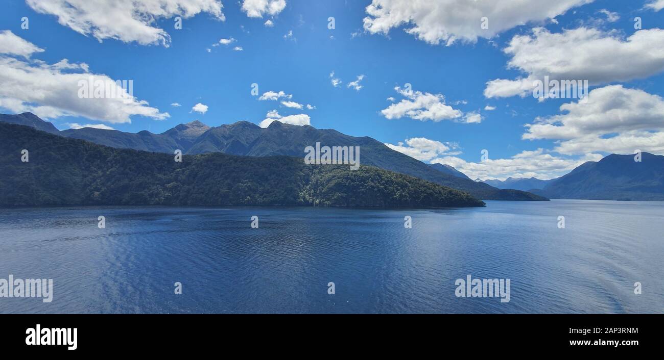 The Majestic Mountains and Dramatic Waterfalls of Milford Sound and ...