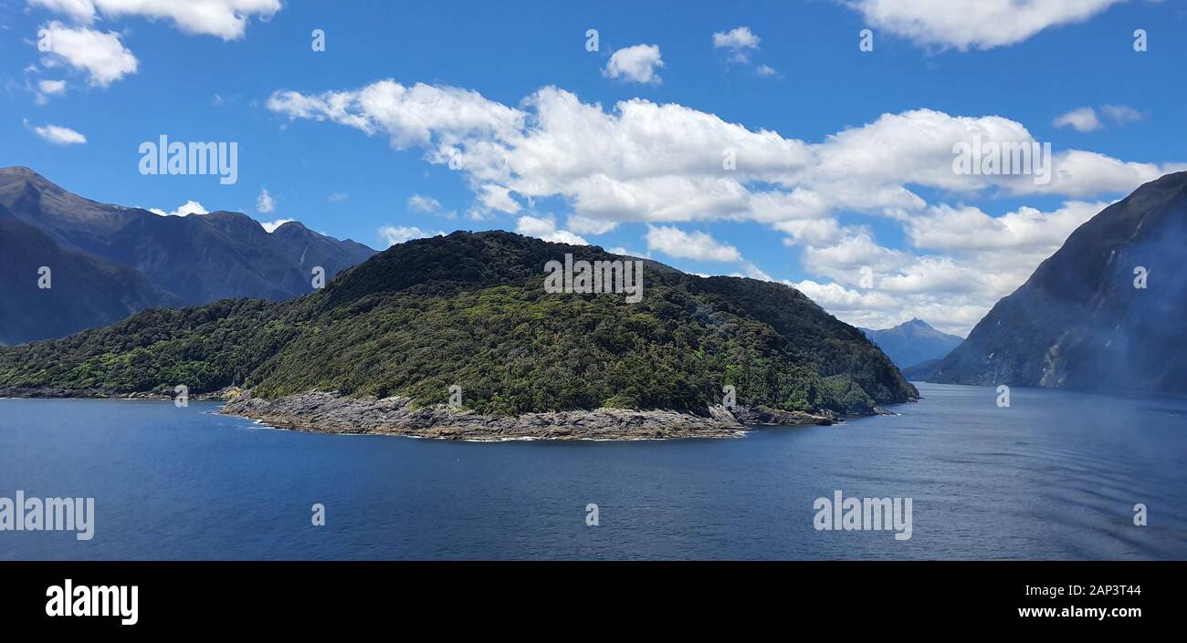 The Majestic Mountains and Dramatic Waterfalls of Milford Sound and ...