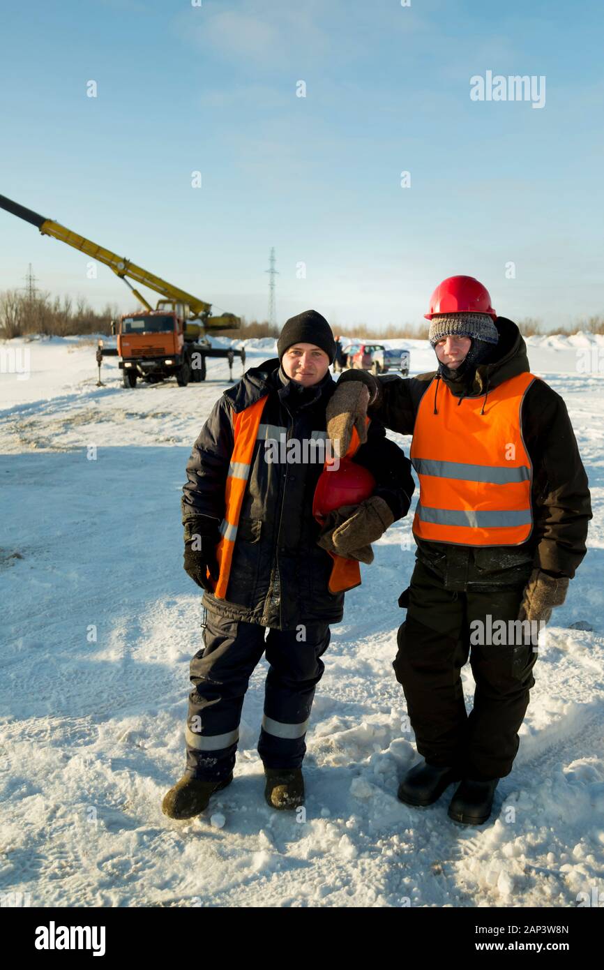 Two workers at the site of the ice camp Stock Photo - Alamy