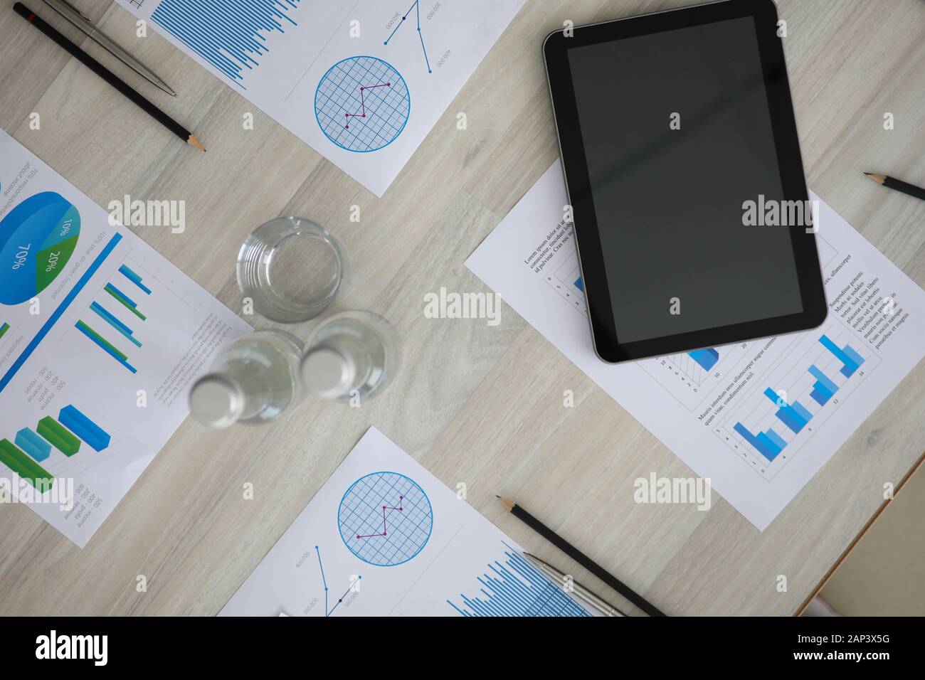 Colourful charts printed on sheets Stock Photo - Alamy