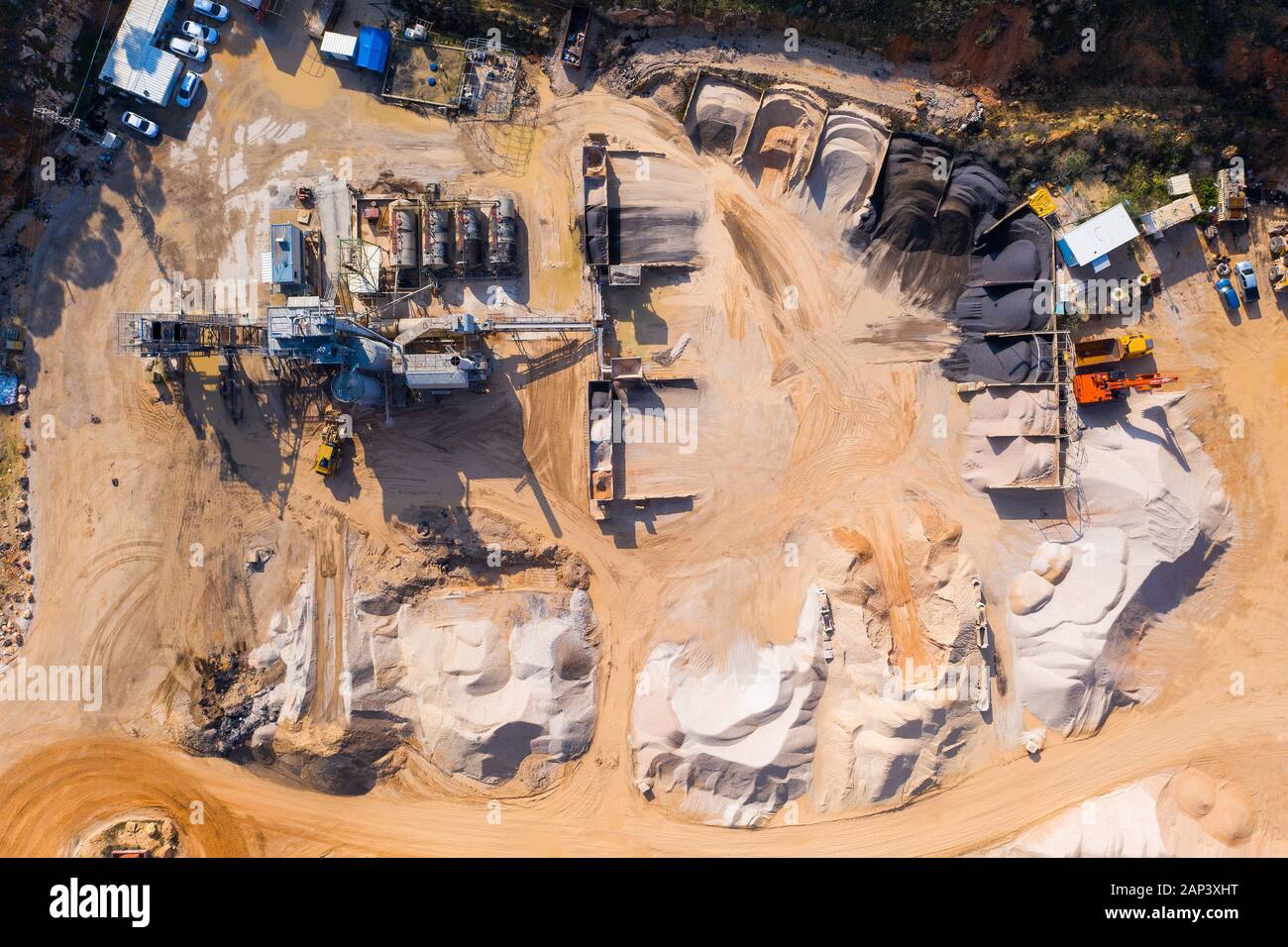 Aerial view of a large Quarry during work hours with Stone sorting ...