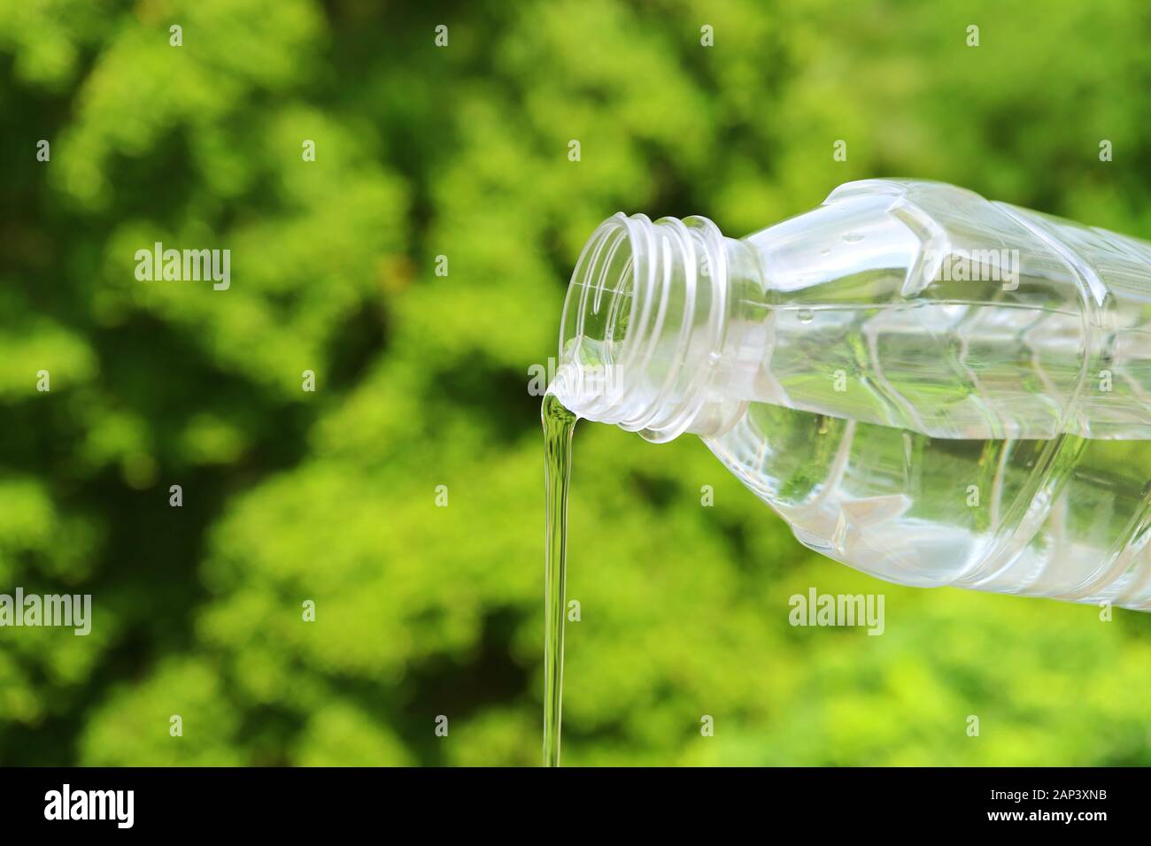Water flowing from bottle hi-res stock photography and images - Alamy